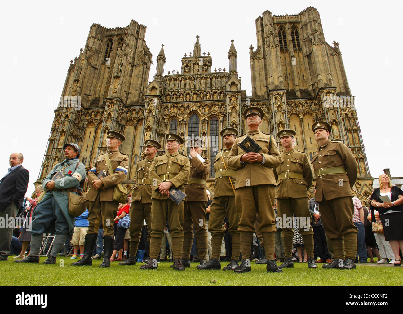 Men dressed in period uniform join hundreds of mourners on Cathedral ...