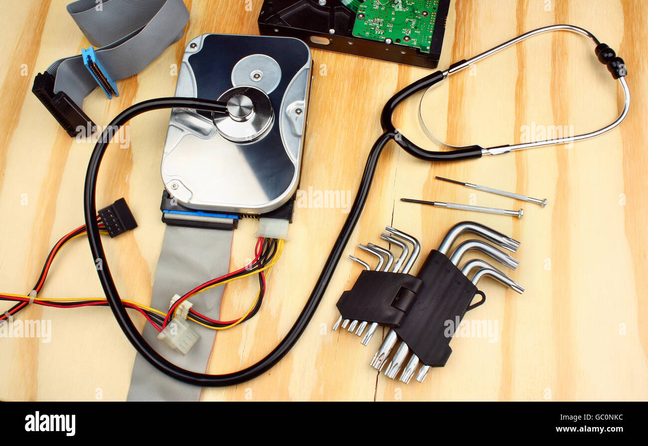 Dead hard disk infected with computer virus and stethoscope Stock Photo ...