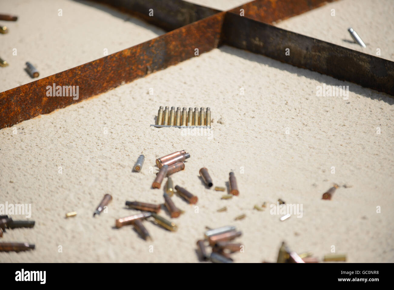 Bullets spent cases on sand hi-res stock photography and images - Alamy