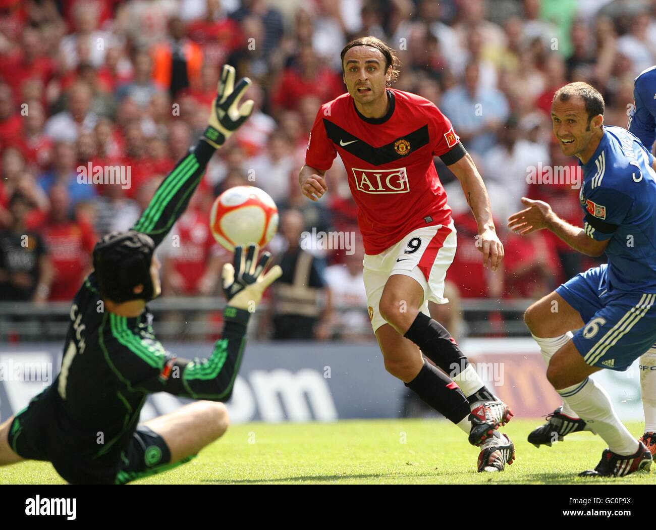 Chelsea goalkeeper Petr Cech saves the shot from Manchester United's ...