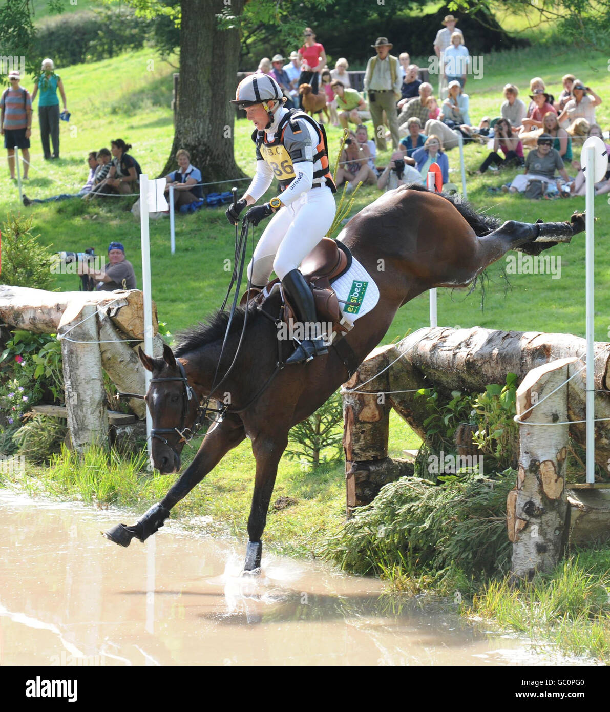 Ruth Edge and Two Thyme jump into the lake at the BETA Water during the ...