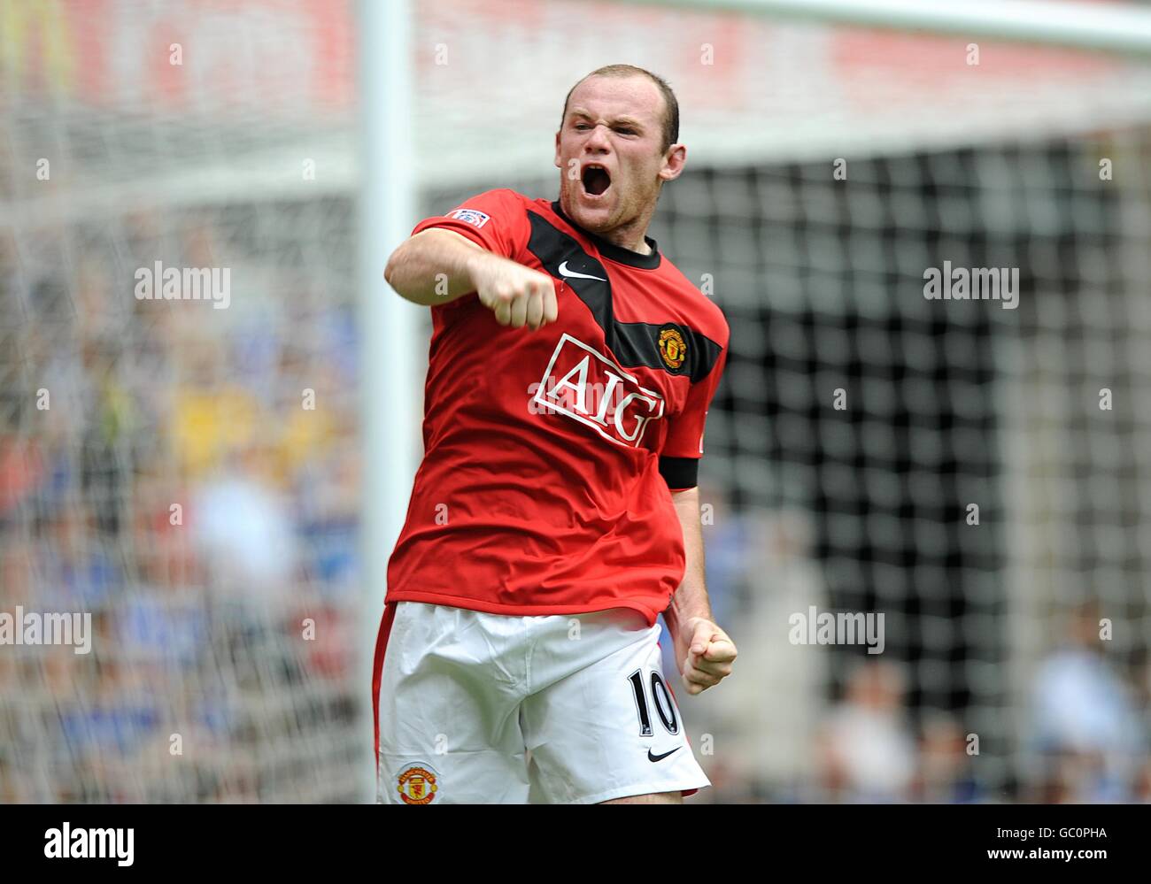 Manchester United's Wayne Rooney celebrates scoring his sides second ...