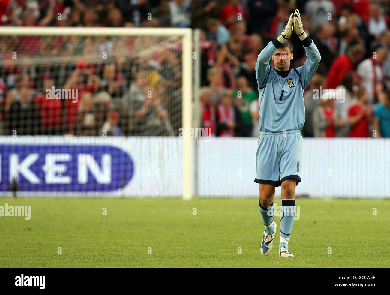Scotlands goalkeeper David Marshall stands dejected after the final ...