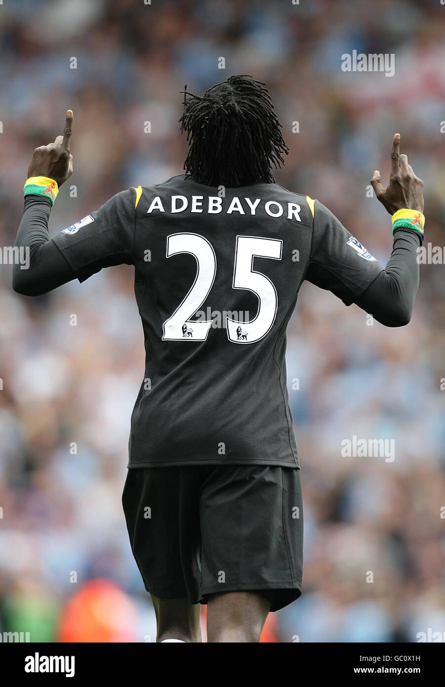 Manchester City's Emmanuel Adebayor celebrates after scoring the first ...