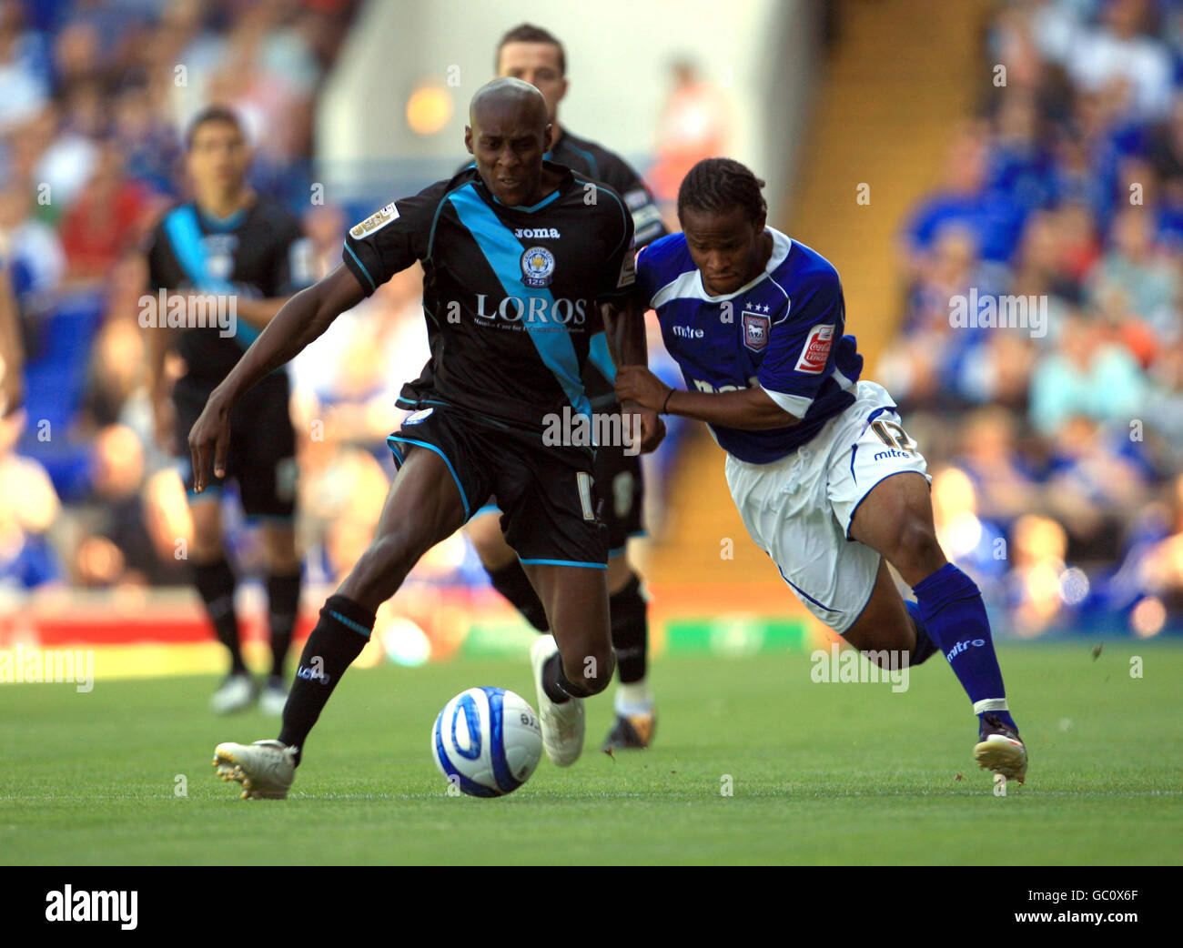 Ipswich Town's Jaime Peters (right) and Leicester City's Lloyd Dyer ...