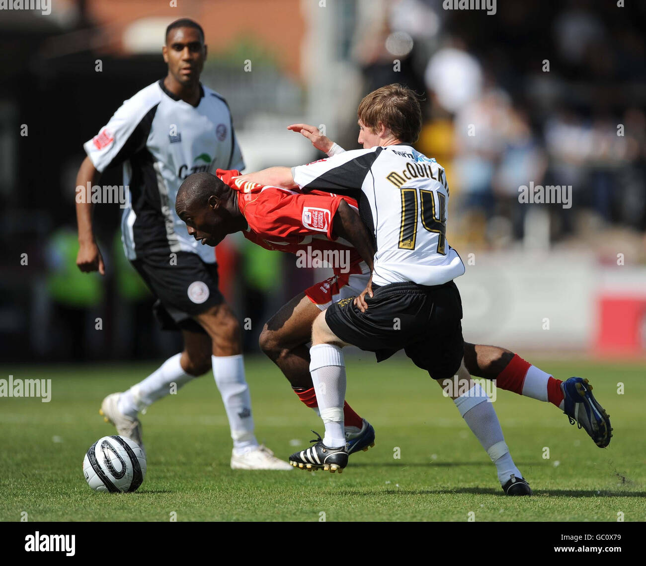 Hereford United's James McQuilkin and Cheltenham Town's Elvis Hammond ...
