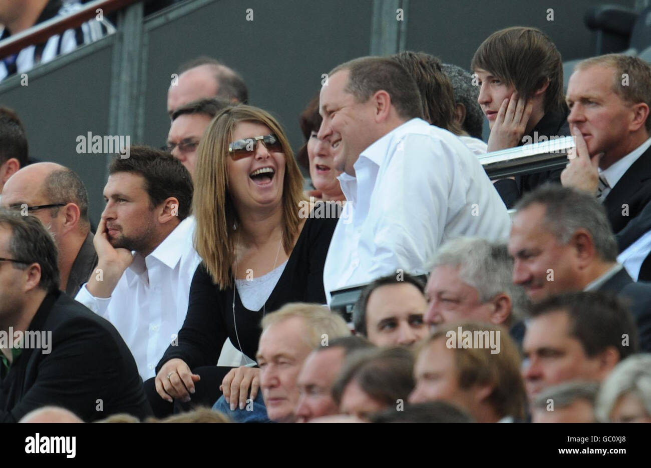 Newcastle United owner Mike Ashley with an unidentified woman during ...