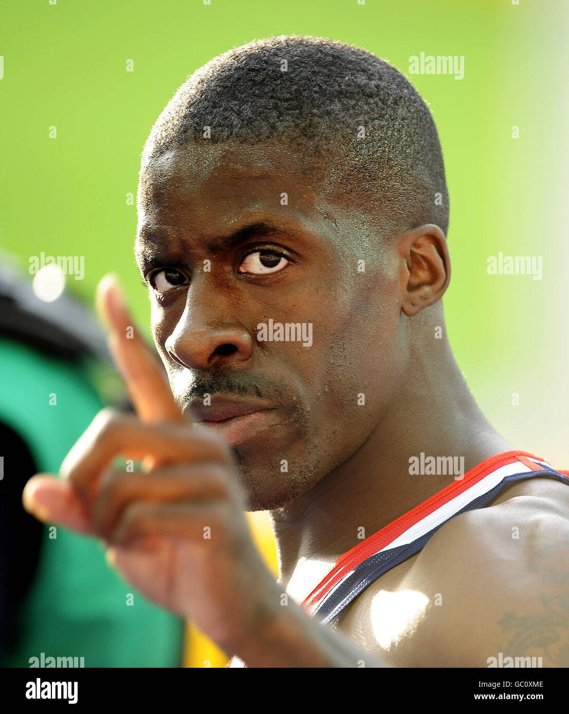 Great Britain's Dwain Chambers points to the crowd after winning his ...