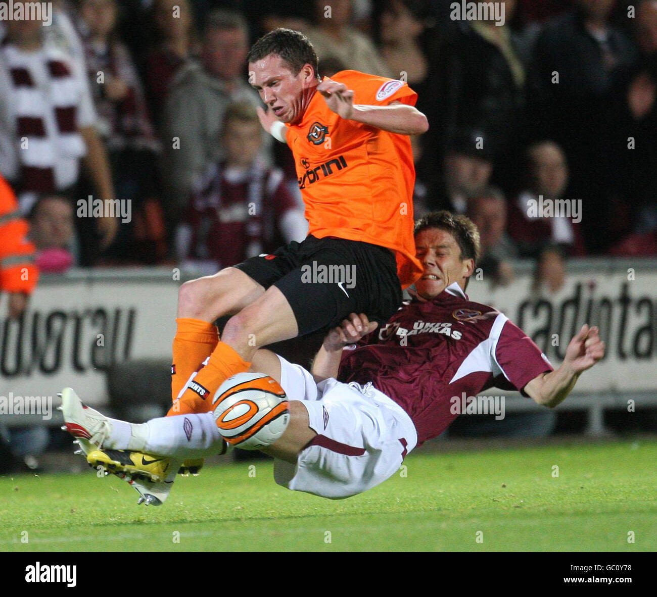 Hearts' Ian Black and Dundee United's Danny Swanson in action during ...