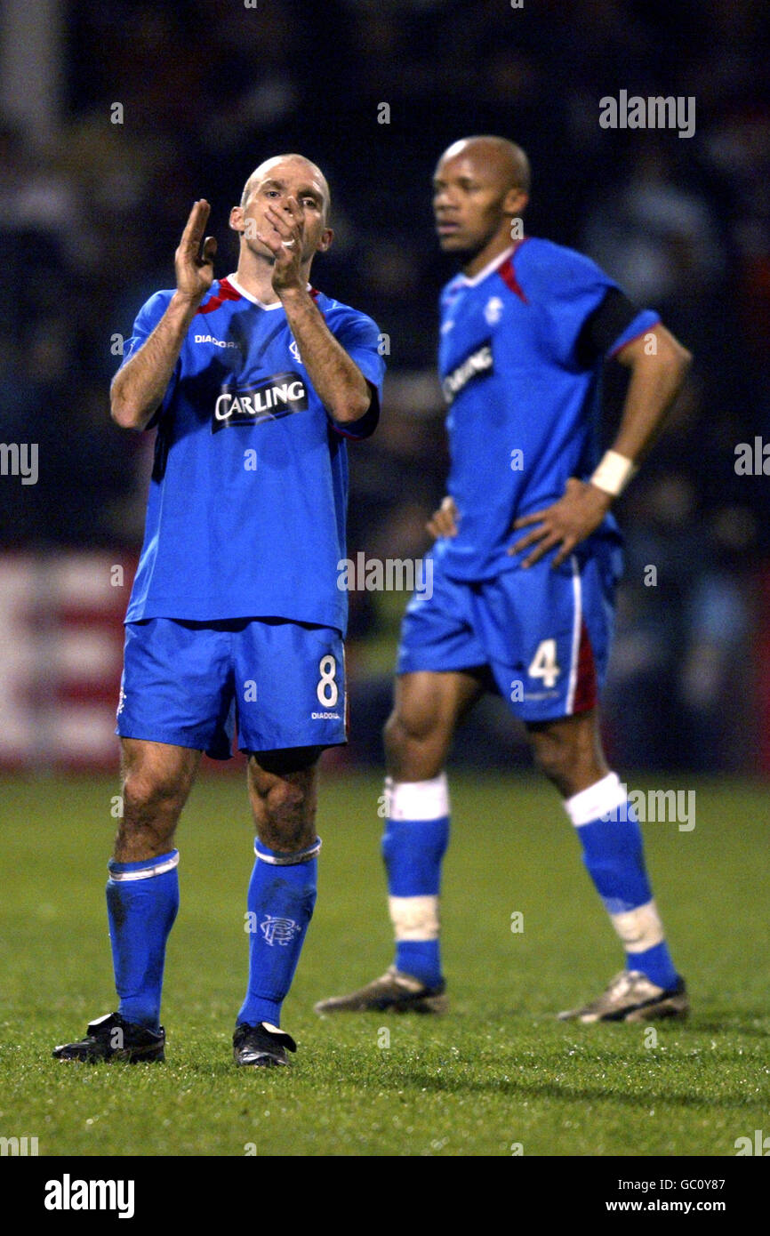 Rangers' Alex Rae and Jean-Alain Boumsong are dejected after the defeat ...