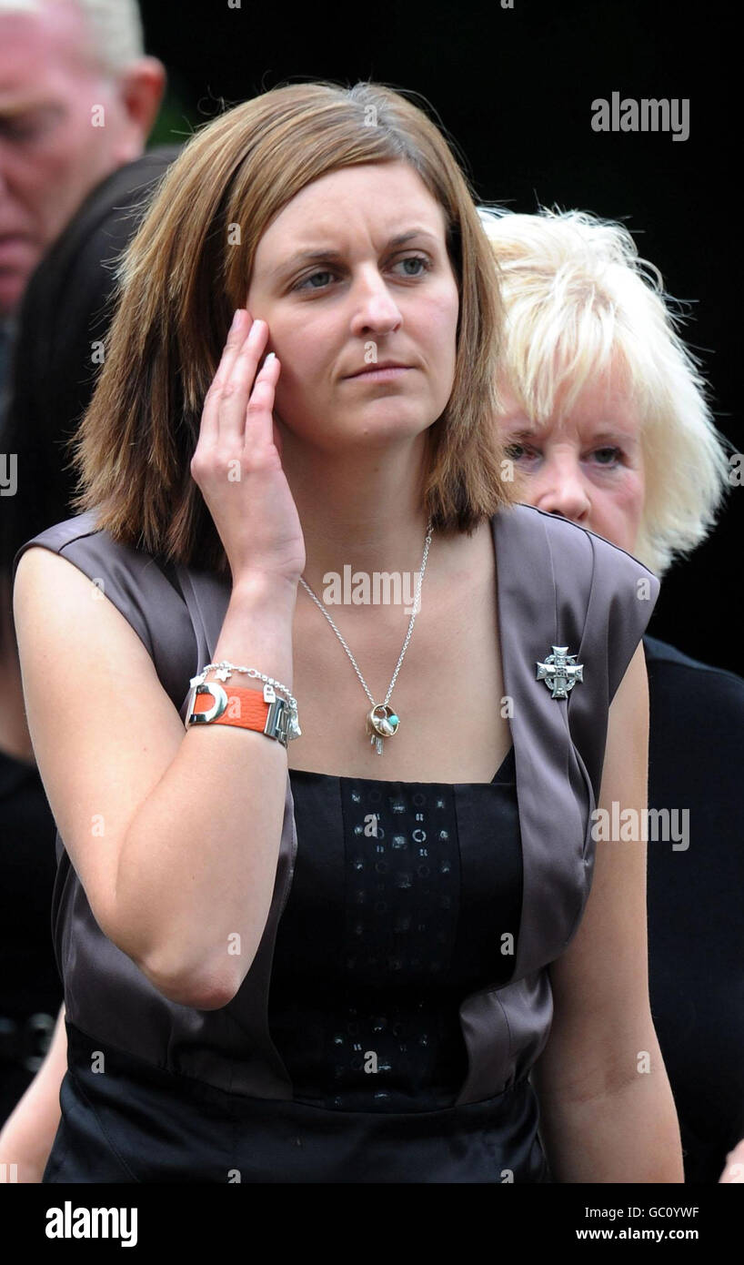 Karen Upton, the wife of Warrant Officer Sean Upton, wearing the ...