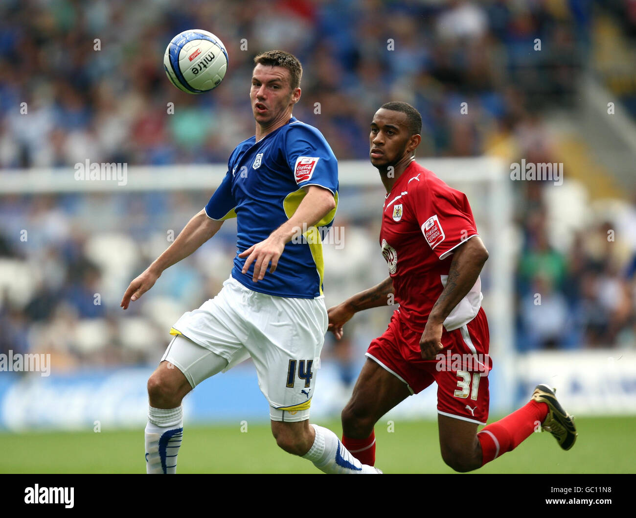 Cardiff City's Paul Quinn under pressure from Bristol City's Danny ...