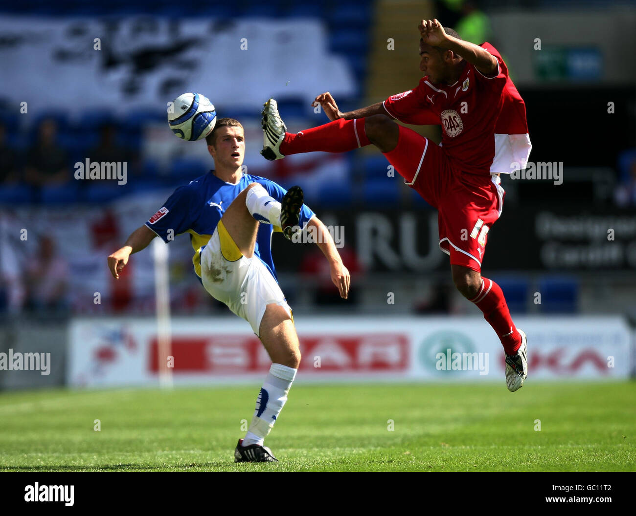Bristol City's Nicky Maynard challenges Cardiff City's Adam Matthews ...