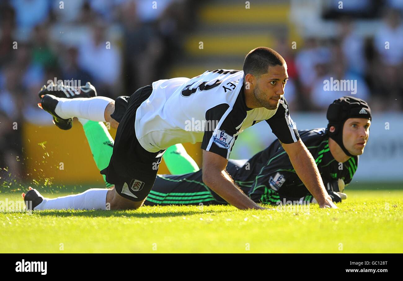 Fulham's Clint Dempsey and Chelsea goalkeeper Petr Cech (right) look on ...