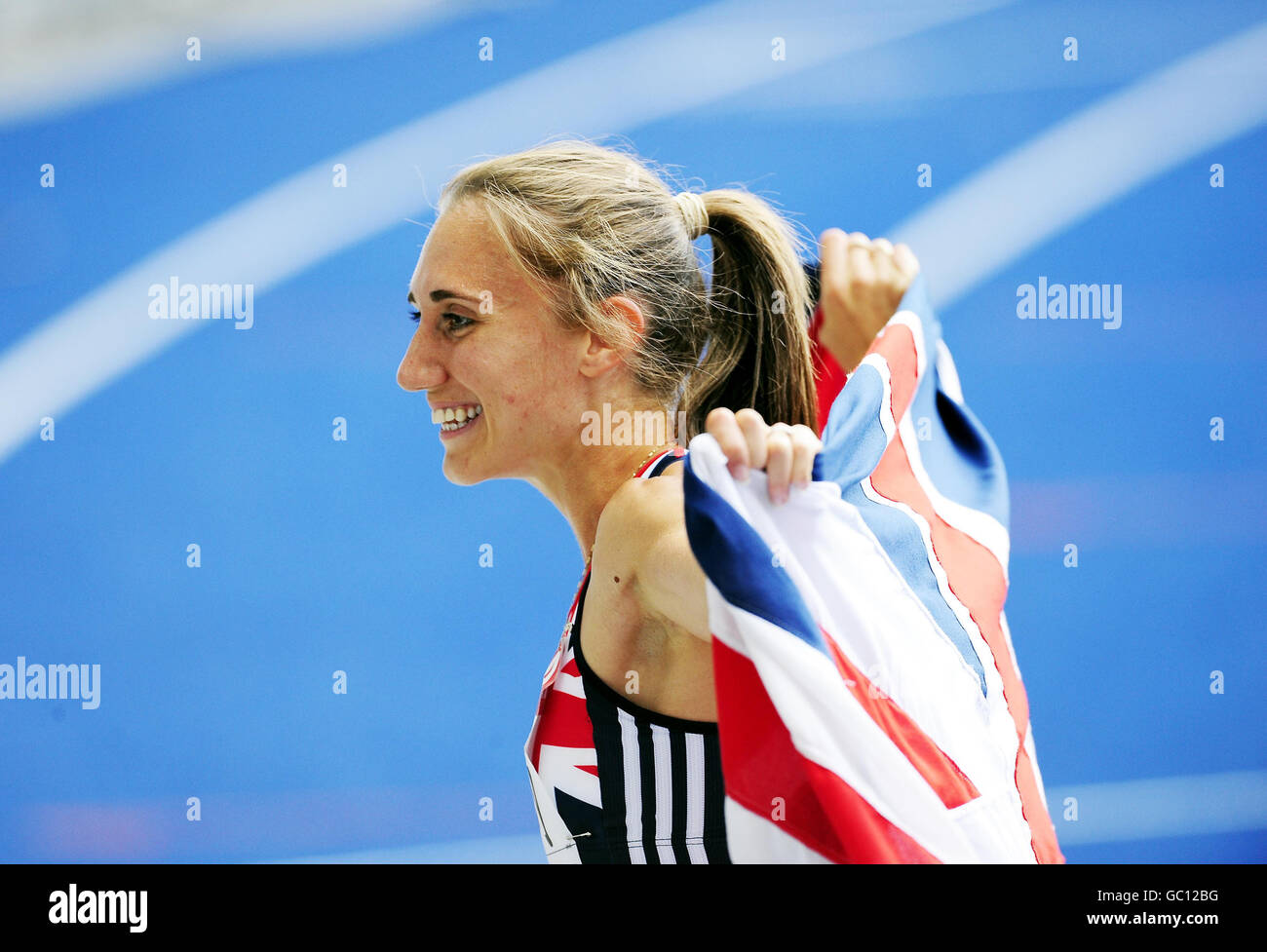 Great Britain's Lisa Dobriskey celebrates her silver medal after ...