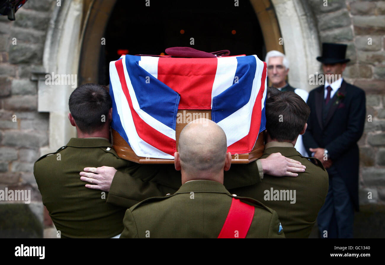 Lance Corporal Dale Hopkins coffin is carried by colleagues into his ...