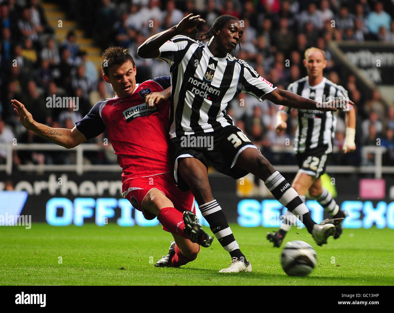 Newcastle United's Nile Ranger battles with Huddersfield's Andy Butler ...