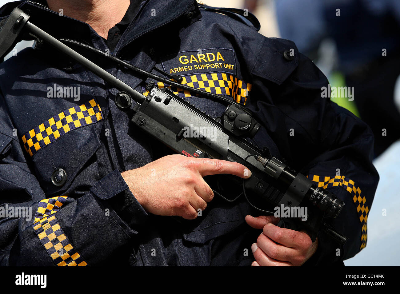 Armed Gardai beside one of the vehicles of the newly formed Eastern ...