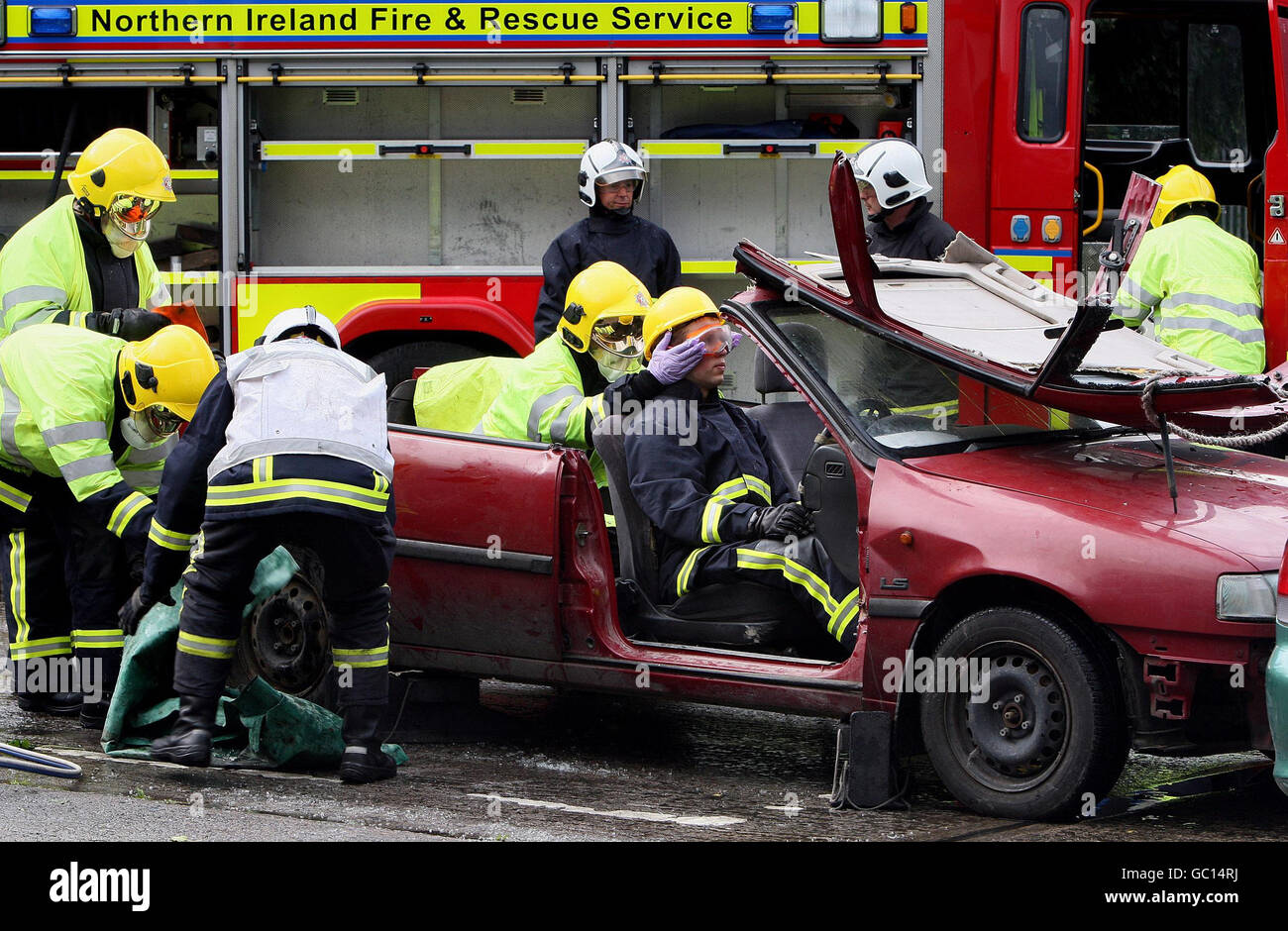 Fire fighters perform a mock rescue during their graduate at Boucher ...