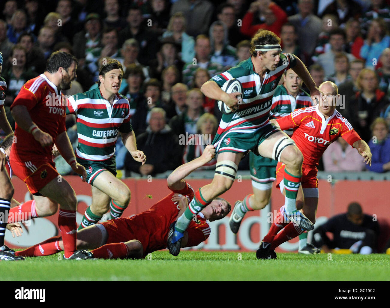 Leicester Tigers' Craig Newby gets away from a tackle by Munster's ...