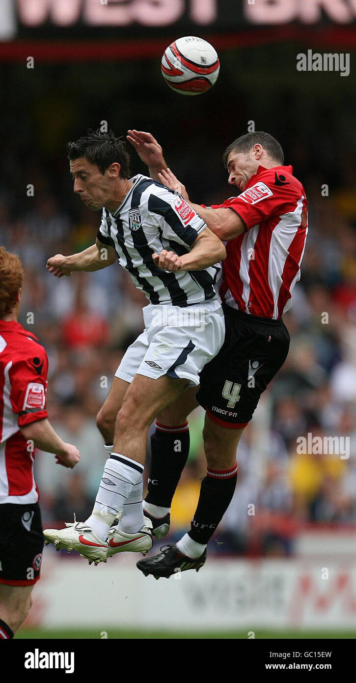 West Brom's Robert Koran (left) and Sheffield United's Nick Montgomery ...