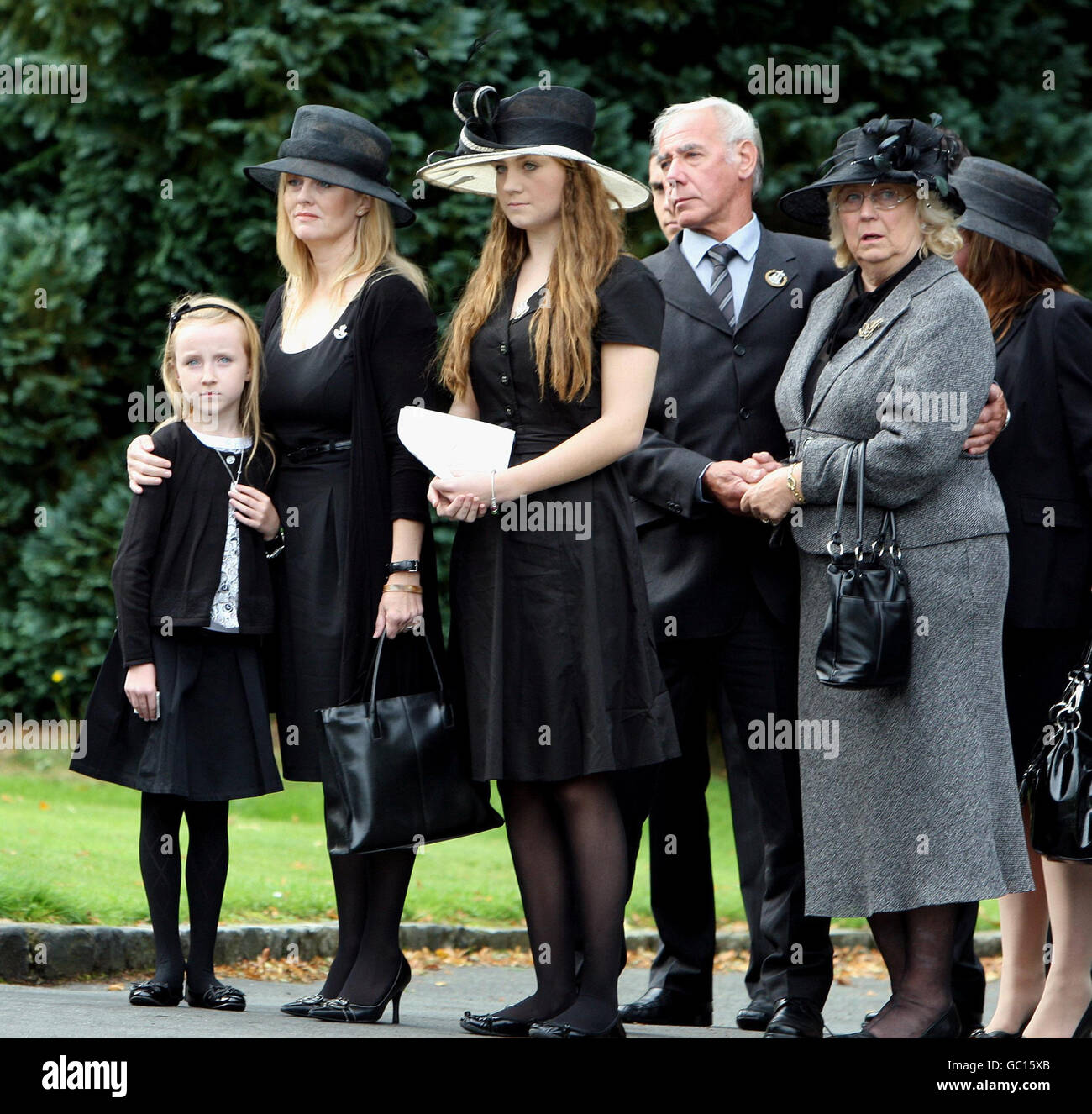 Brenda Hale (second left) at the funeral of her husband Captain Mark ...