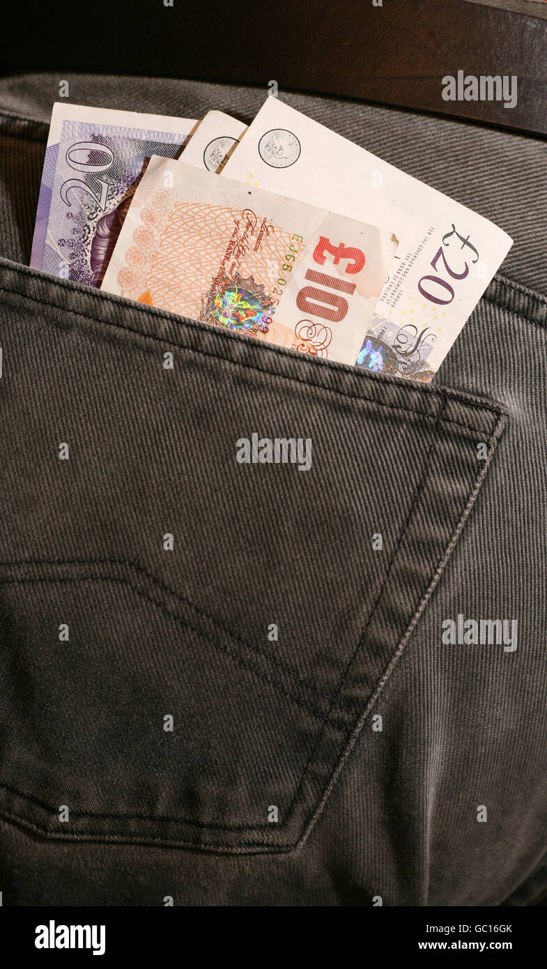 Cash in a back pocket Stock Photo - Alamy