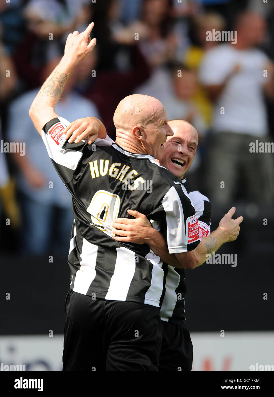 Notts County's Lee Hughes celebrates with team mate Luke Rodgers (right ...