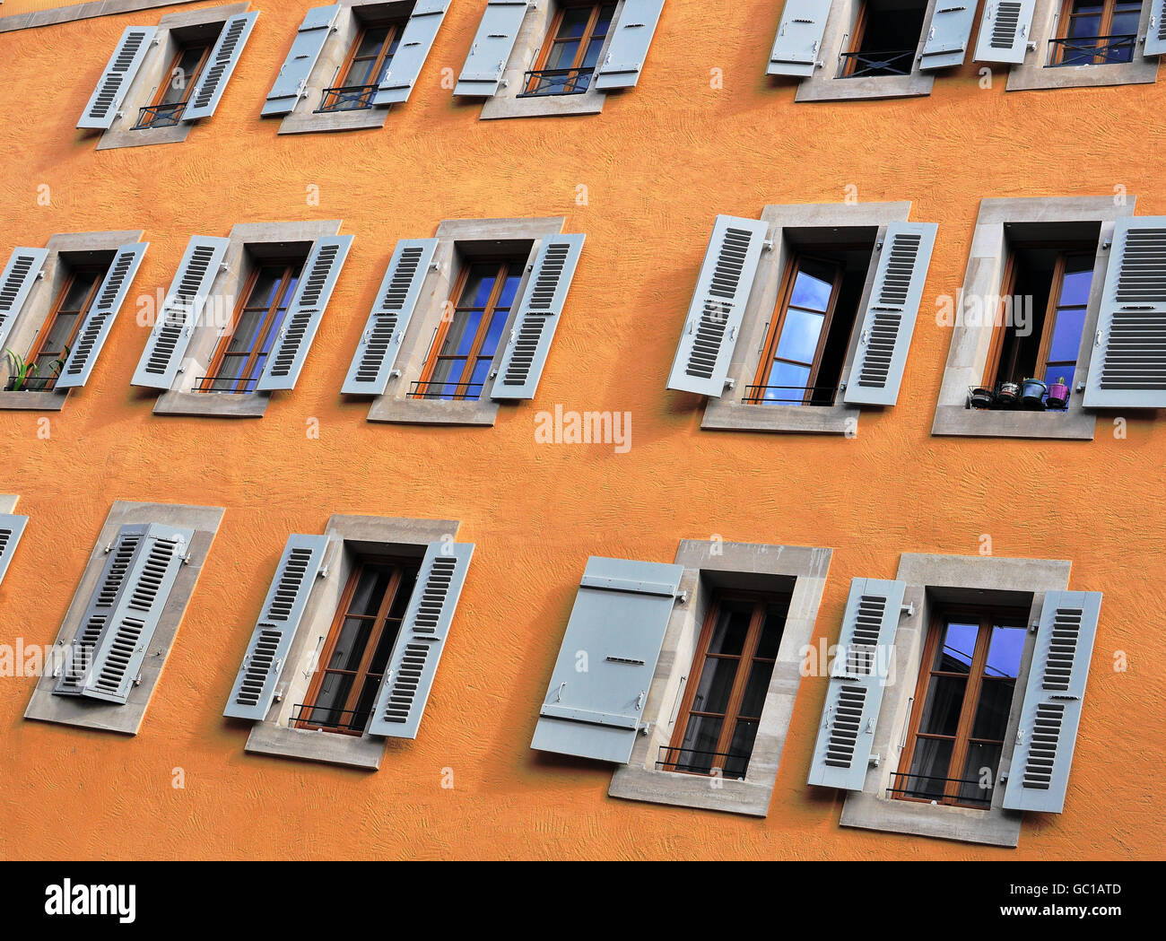 Open windows in the modern yellow house, Geneva, Switzerland Stock ...
