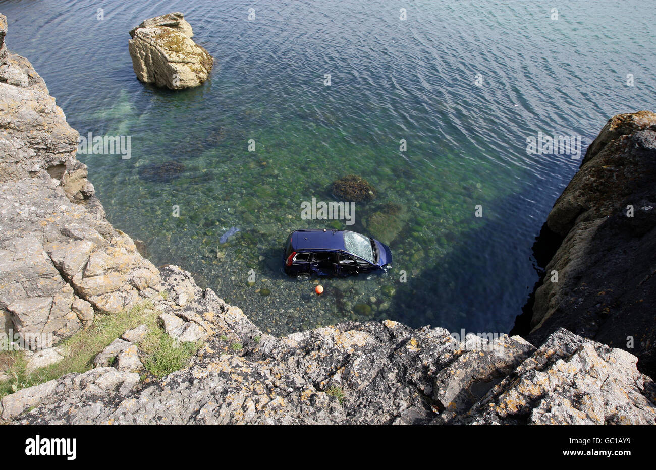Girl cheats death after car goes over cliff Stock Photo - Alamy