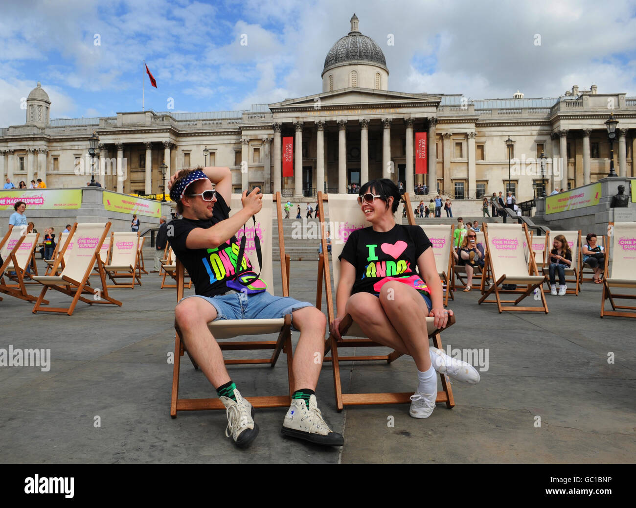Two London workers Nick Ludlow, 27 and Stevie Tyler, 25, enjoying a ...