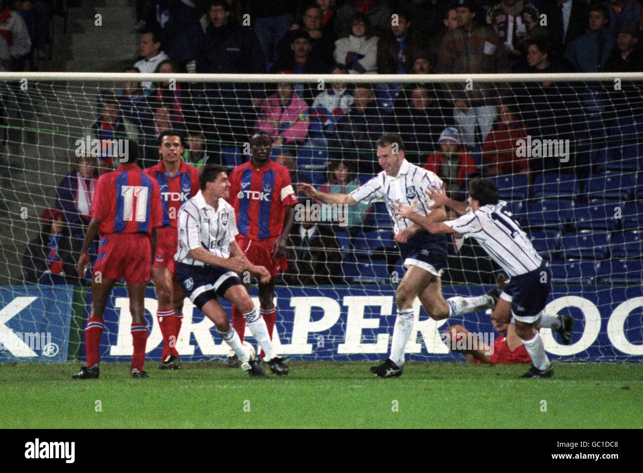 Dave Watson celebrates with teammates Paul Rideout (l) and Preki (r ...