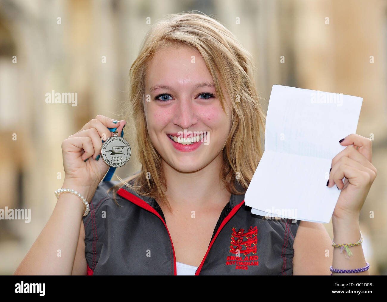 Holding up a level exam results hi-res stock photography and images - Alamy