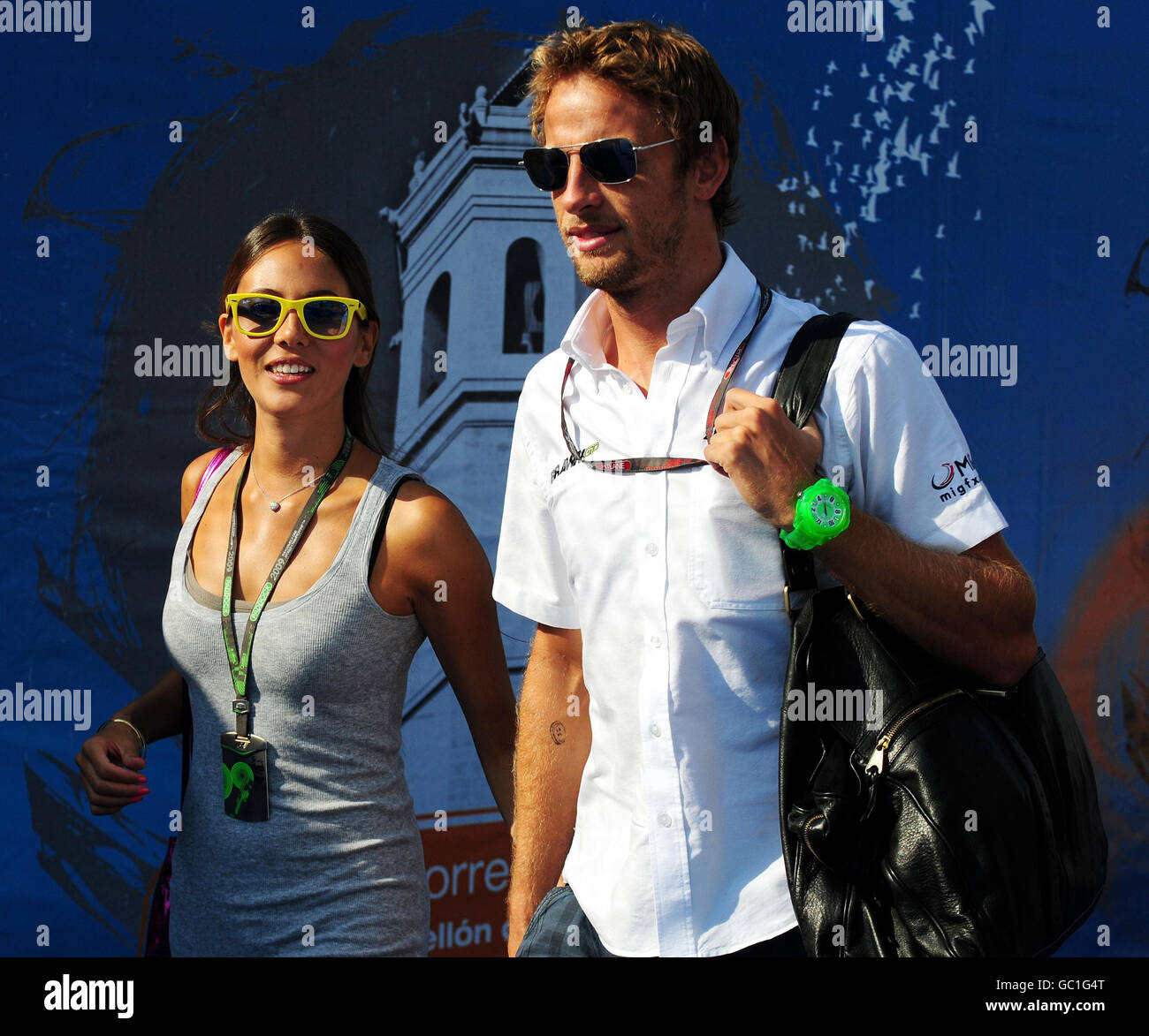 Brawn GP's Jenson Button and girlfriend Jessica Michibata arrive at the ...