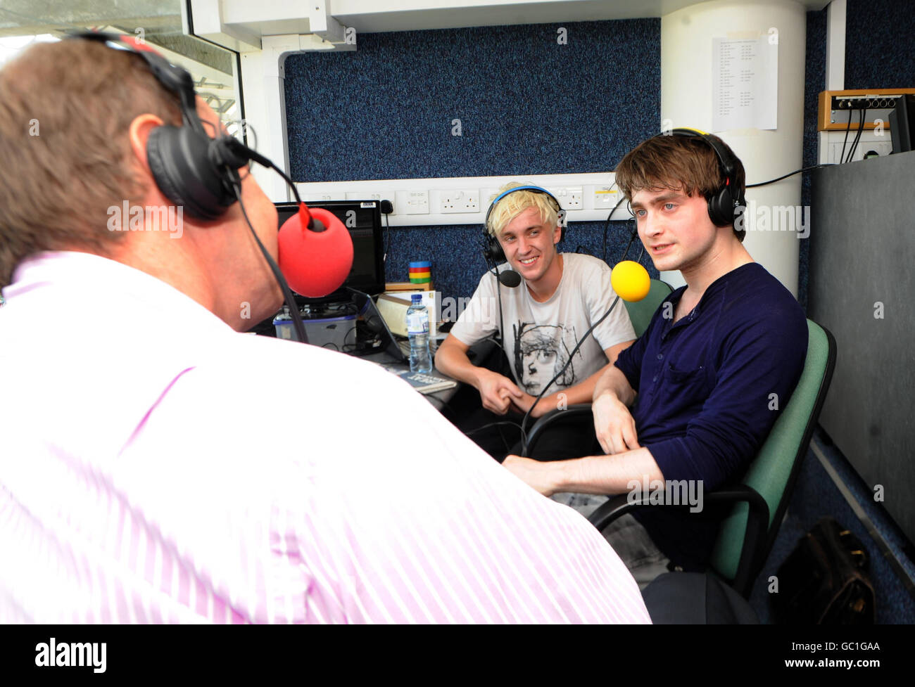 Jonathon Agnew (left) interviews Tom Felton (centre) and Daniel ...