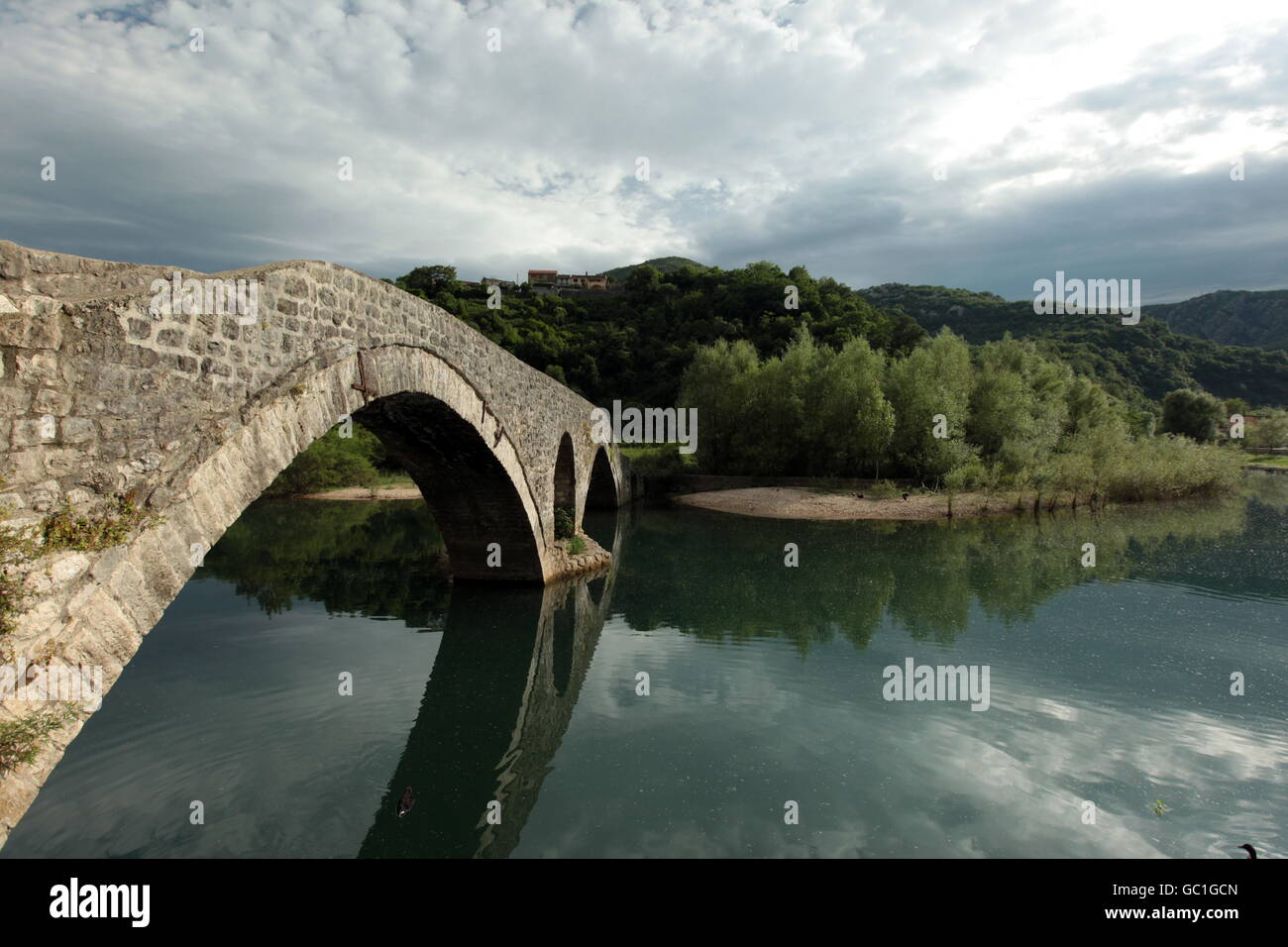 the river and Town of Rijeka Crnojevica at the west end of the Skadarsko Jezero Lake or Skadar ...