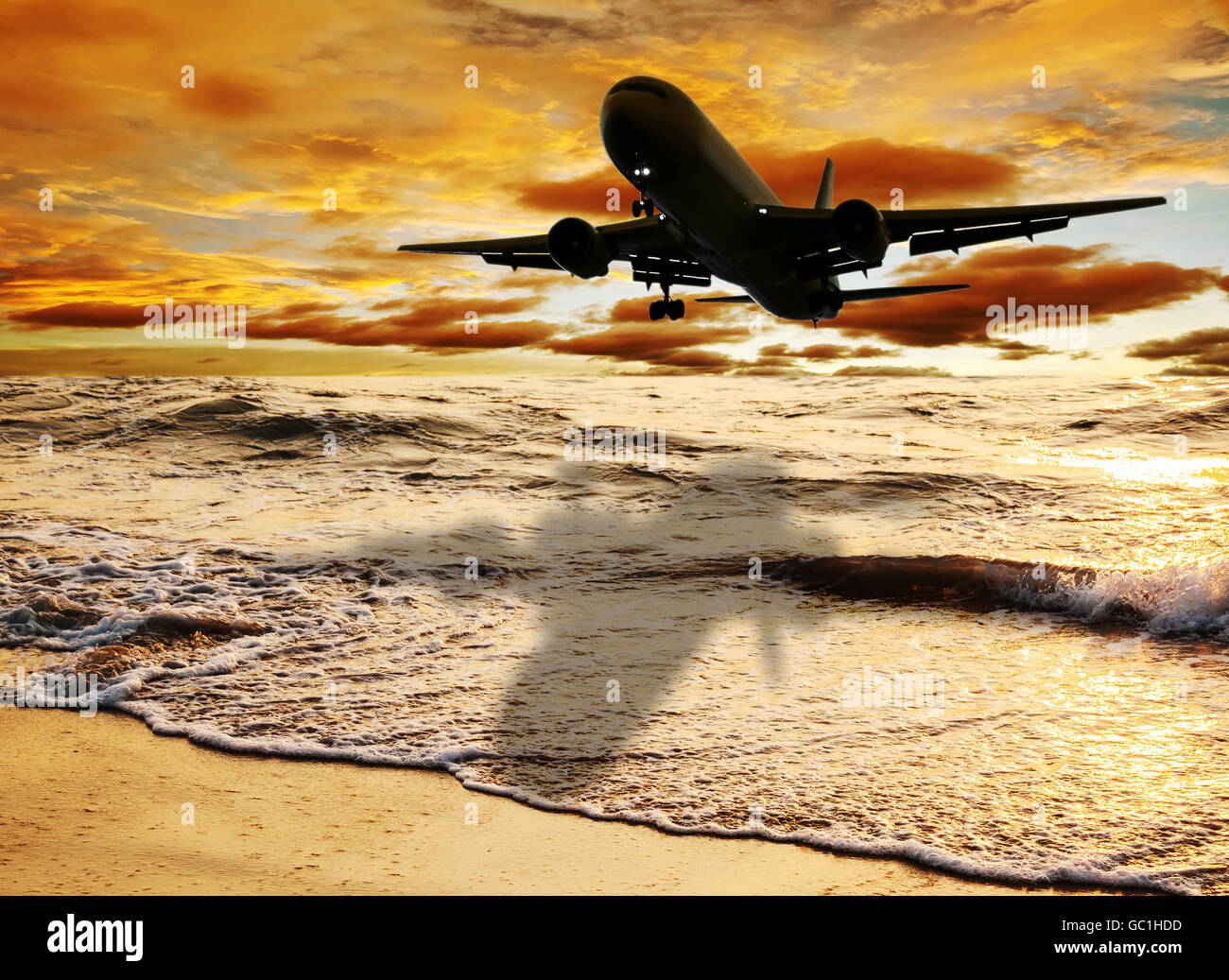 Beach with plane on color of the sunset in twilight over light the sun ...
