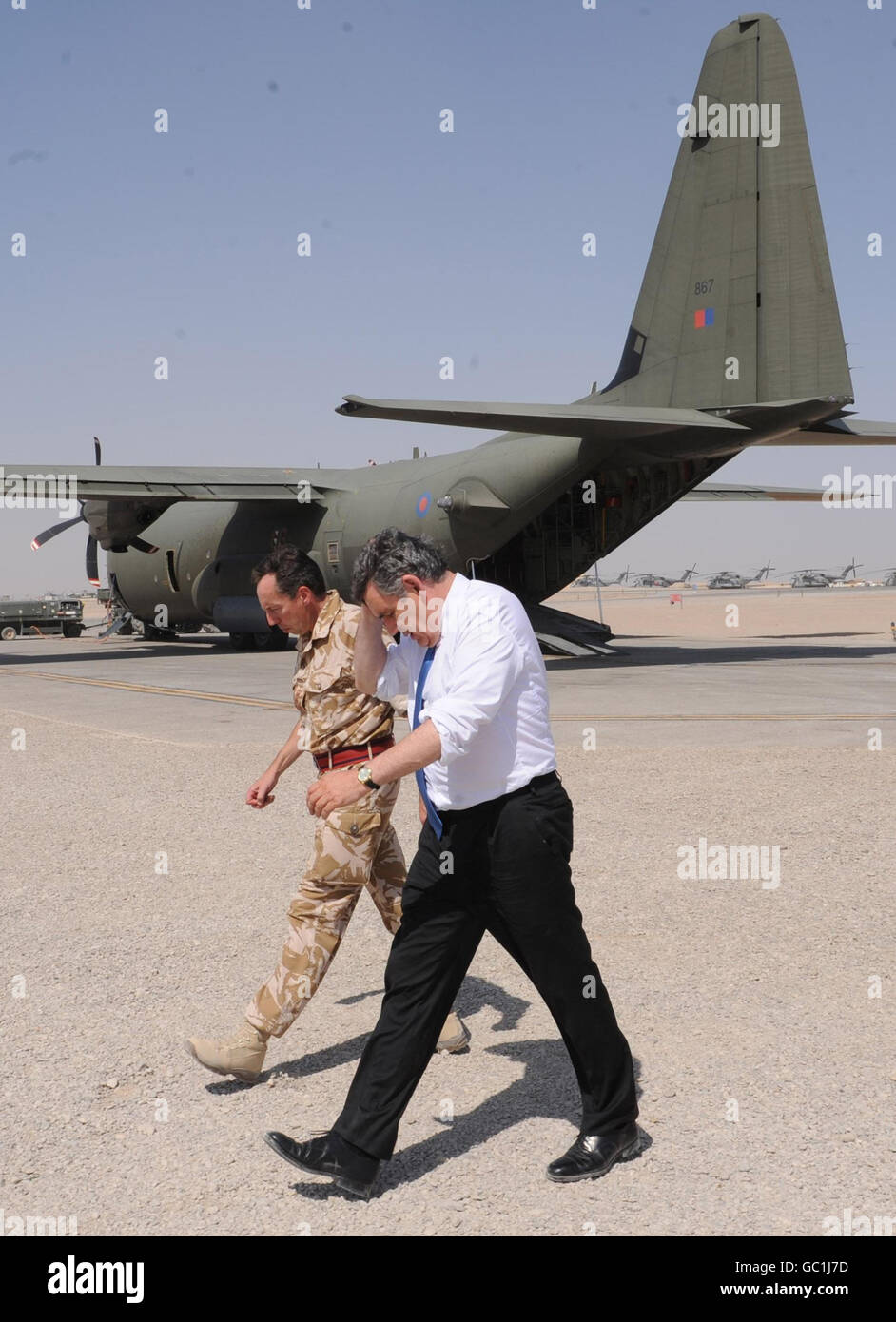 Prime Minister Gordon Brown is met by Brigadier Christopher Tickell at ...