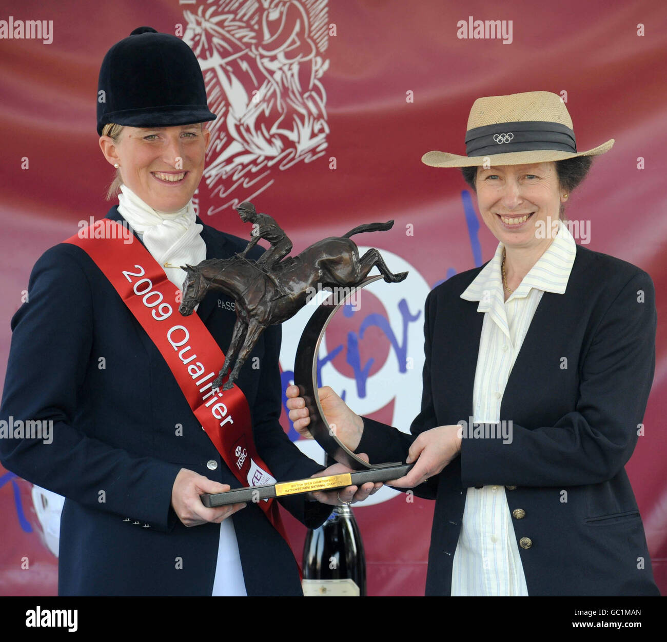 After winning on Two Thyme, Ruth Edge (left) receives the trophy from ...