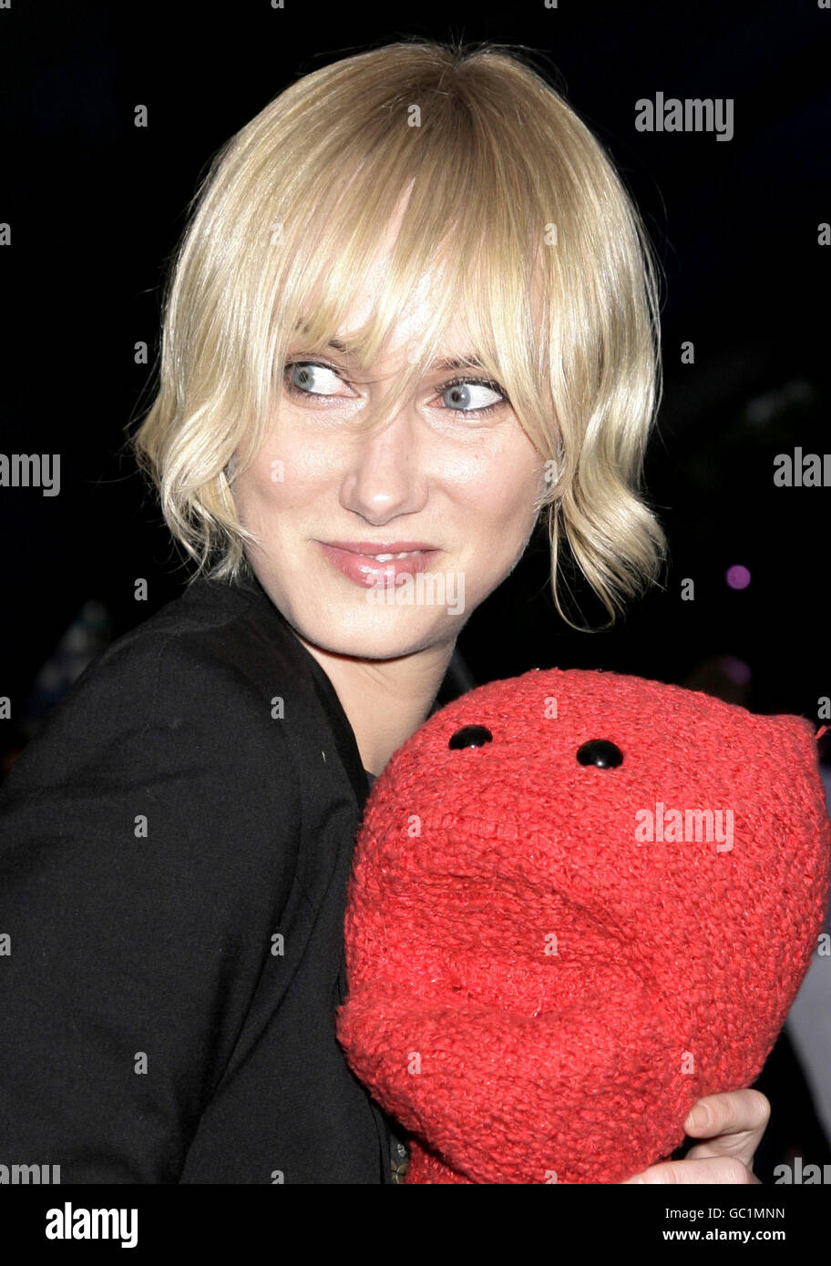 Kimberley Stewart poses with 'Red', the Virgin 1 digital channel mascot ...