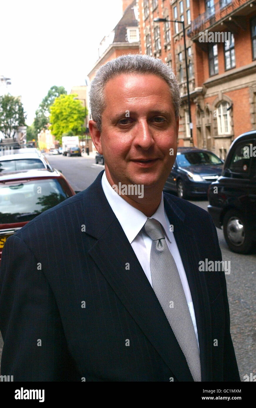 Foreign Office Minister Ivan Lewis leaves the Milbank TV studios in ...