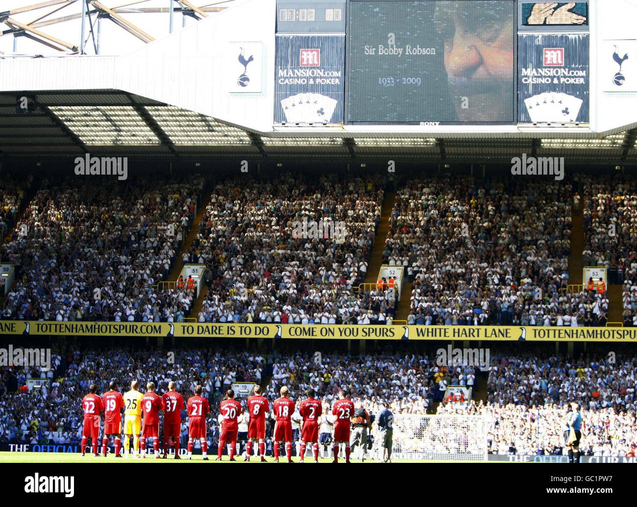 Both teams hold a minutes applause in tribute to Sir Bobby Robson ...