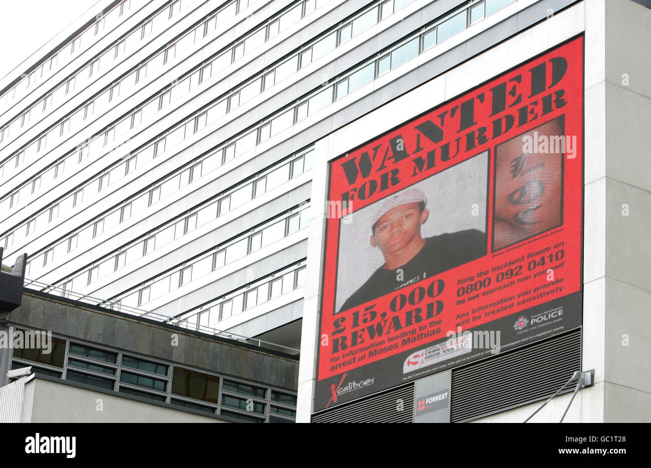 The wanted poster being screened on an electronic billboard in ...