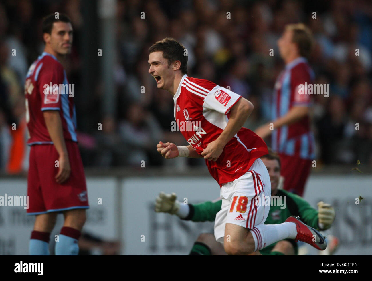 Middlesbrough's Adam Johnson (left) celebrates scoring the opening goal ...