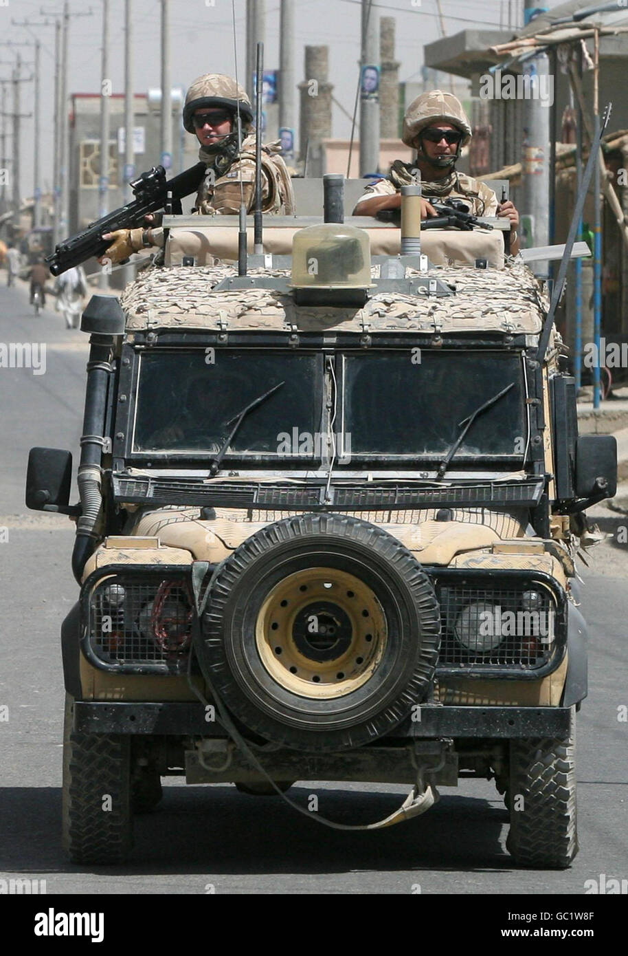 Members of The 40th Regiment The Royal Artillery in a snatch Land Rover ...