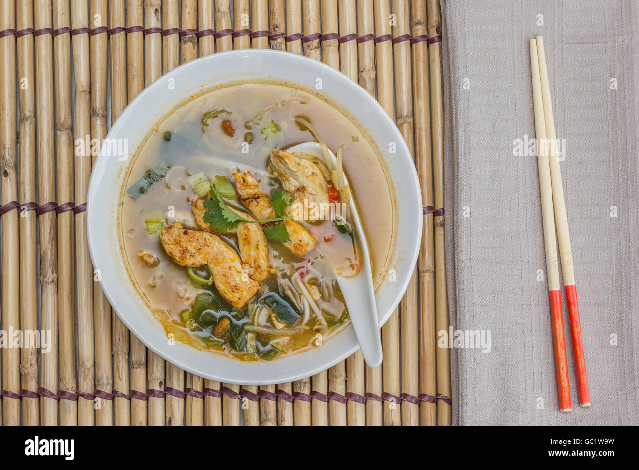 Asian chicken soup with vegetables and cilantro Stock Photo - Alamy
