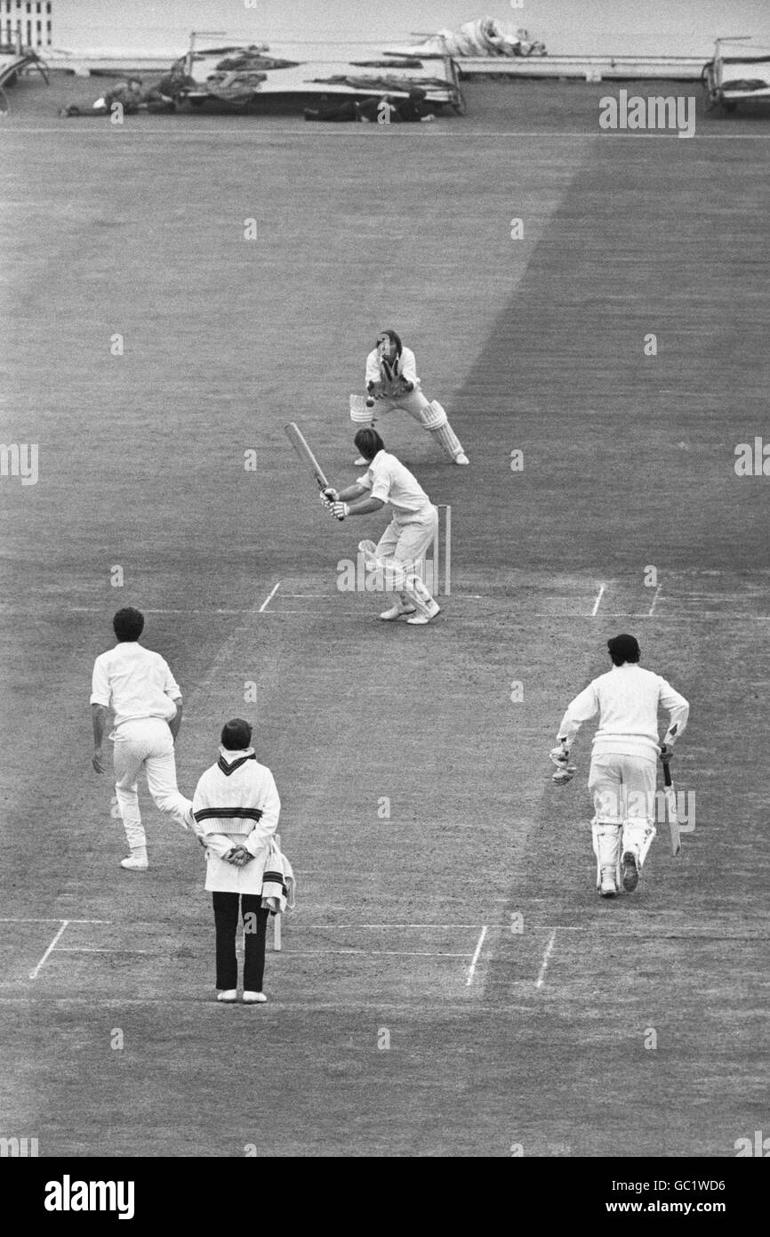 The ball sails into the cupped hands of rodney marsh hi-res stock ...