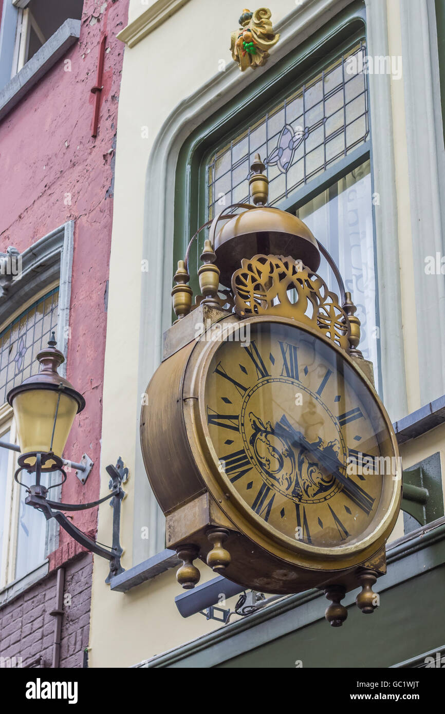 Old street clock in the old center of Nijmegen, Holland Stock Photo - Alamy