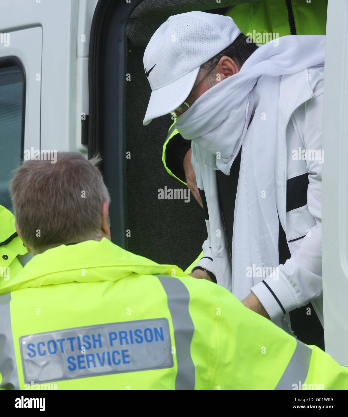 Lockerbie bomber Abdelbaset Ali Mohmed Al Megrahi leaves a police van ...