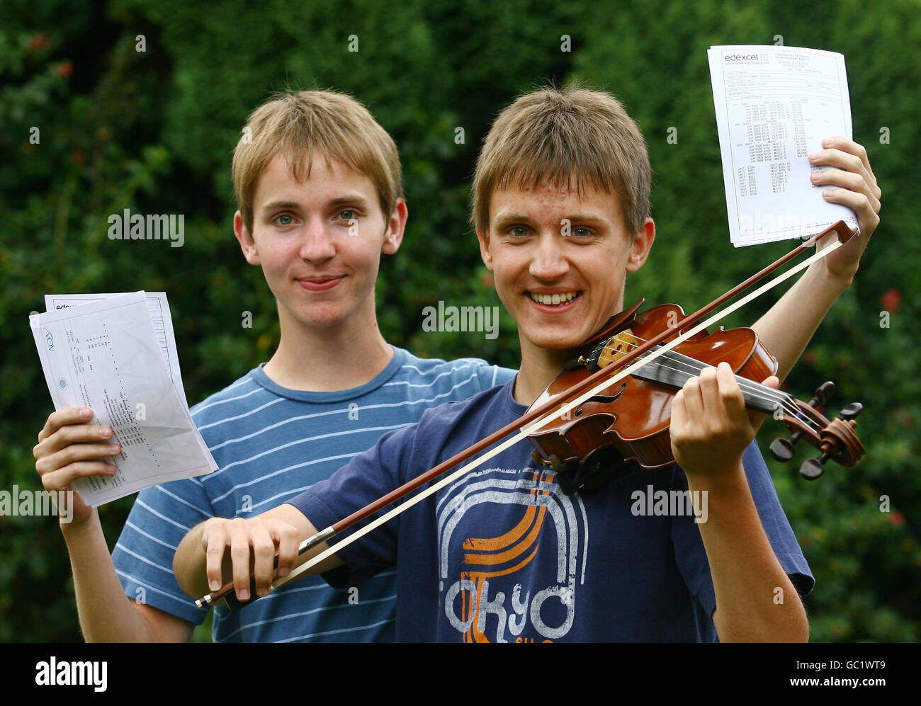 Education exam results smiling celebrating pupils students hi-res stock ...